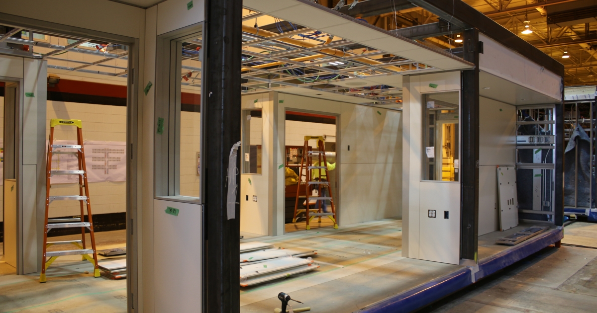 Carpenters build prefabricated and self- sufficient critical care units ...